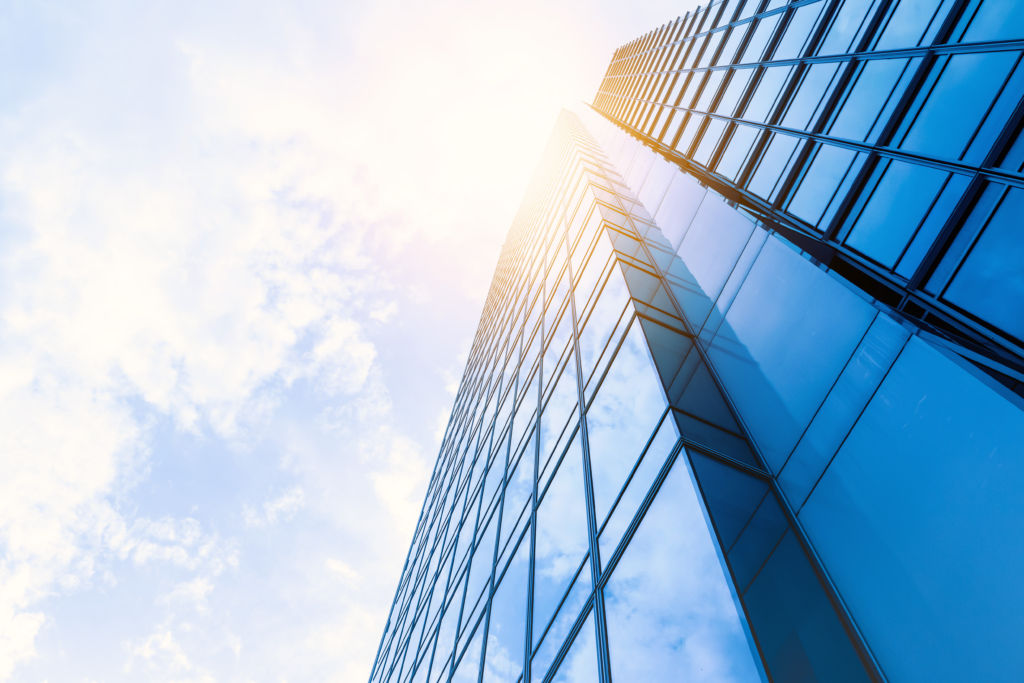 Windows of Skyscraper Business Office with blue sky, Corporate building ...